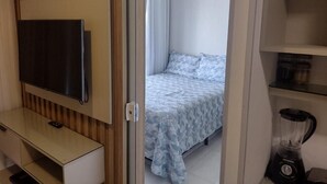 Apartamento urbano | 1 quarto, ferros/tábuas de passar roupa, Wi-Fi de cortesia