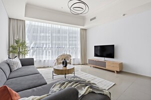 Apartamento grand | Área de estar | Smart TV 50 polegadas com canais digitais