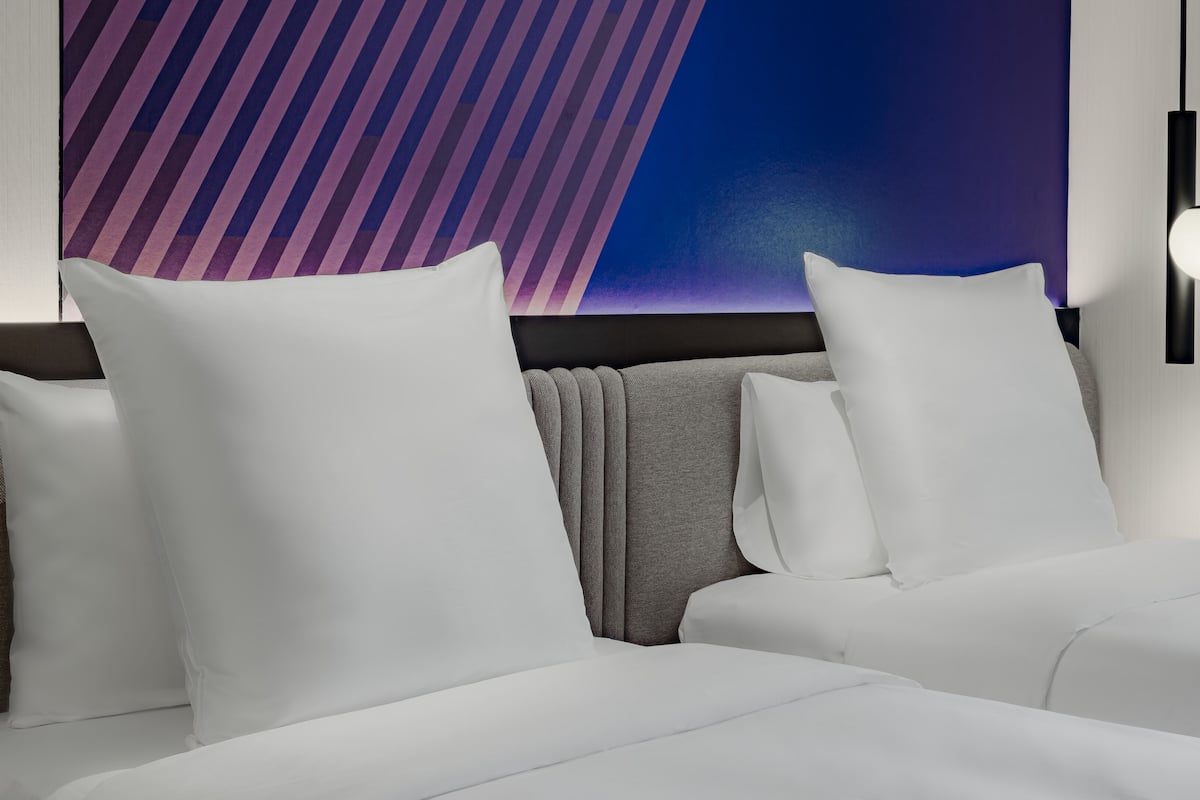 Quarto Twin (TRIBE Essential) | 1 quarto, roupa de alta qualidade, minibar, cofre no quarto