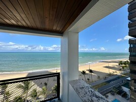 Quarto triplo superior | Vista para praia/oceano