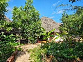 Quarto Familiar | Vista para o jardim