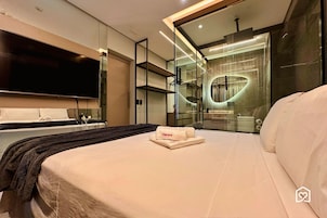 Suíte superluxo | Individualmente mobiliados, Wi-Fi de cortesia, roupa de cama