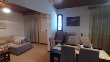 Apartamento Deluxe | Sala de estar