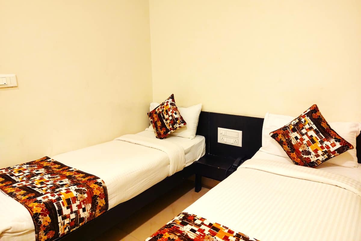 Quarto Duplo ou Twin Deluxe | 1 quarto, ferro/tábua de engomar, Wi-fi grátis