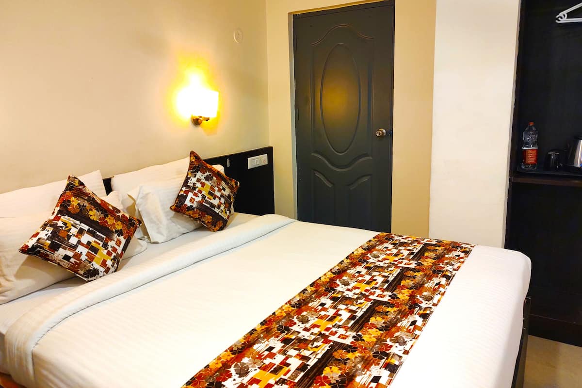 Quarto Deluxe | 1 quarto, ferro/tábua de engomar, Wi-fi grátis