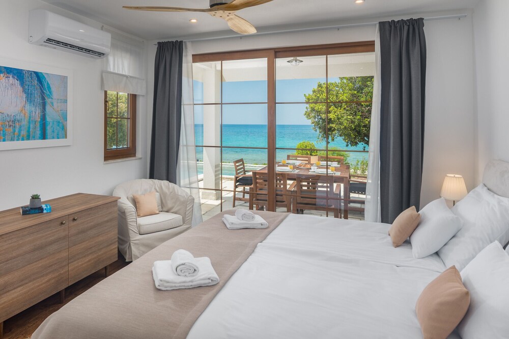 Villa Porto Bus Beachfront by Villas Guide - Bale | Vrbo