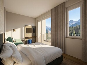 Quarto com cama, televisão, varanda e vista para as montanhas.