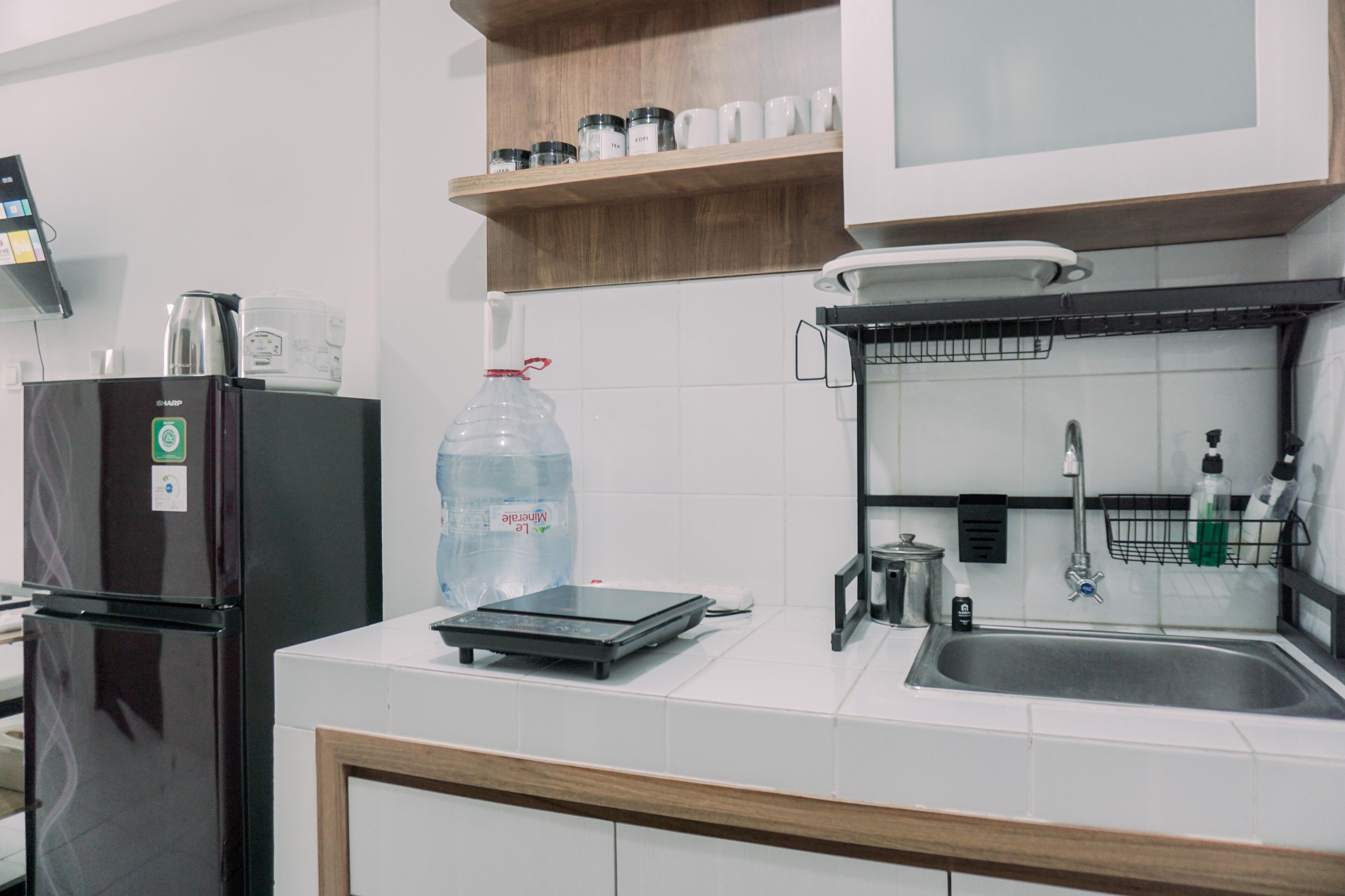 Apartamento | Cozinha privada | Um frigorífico/congelador grande, uma placa de cozinha 
