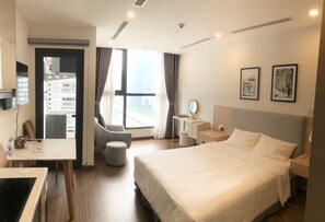 Apartamento Empresarial, 1 cama king-size, Vista para a cidade | Secretária, cortinas/cortinados opacos, quartos insonorizados
