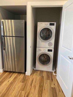 Apartamento, casa de banho privativa, Vista para a cidade | Lavandaria
