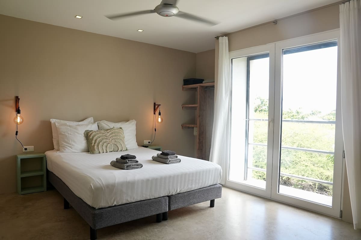 Quarto conforto | Cofres nos quartos, cortinas blackout, quartos à prova de som