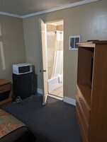 Quarto Individual Deluxe | Roupa de cama fornecida 