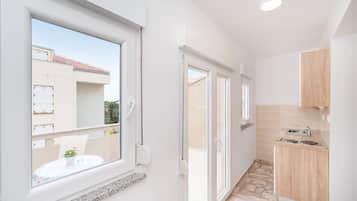 Estúdio, vários quartos, varanda, vista para o jardim | Interior