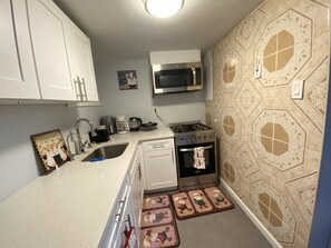 Estúdio, 1 quarto, fumadores, pátio | Cozinha privada