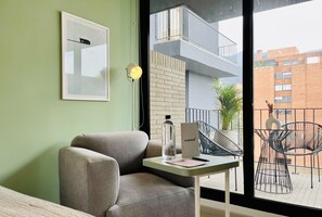 Apartamento exclusivo | Área de estar | Smart TV 40 polegadas com canais a cabo