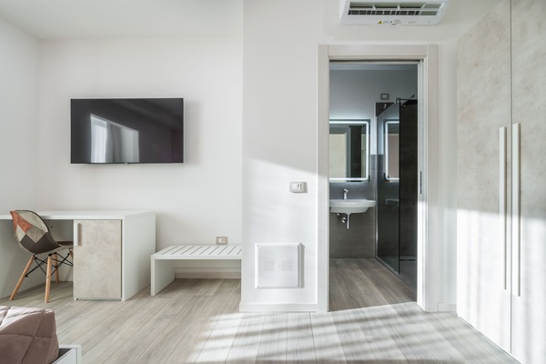 Quarto Deluxe | Camas de colchão viscoelástico, secretária