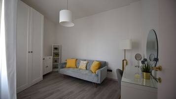 Apartamento Exclusivo | Sala de estar | Smart TV de 43 polegadas com canais digitais, piso aquecido