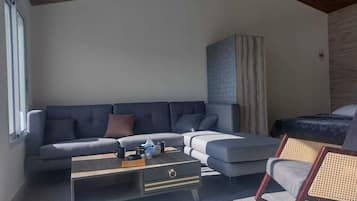 Chalé | Sala de estar | Lareira