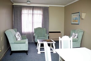 Suite Comfort | Sala de estar | Smart TV 