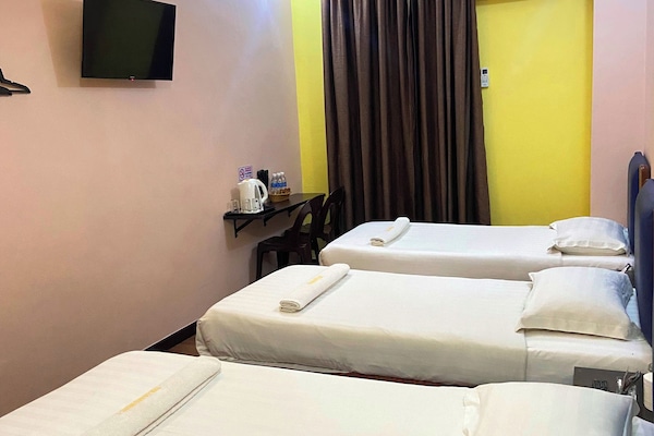 Quarto triplo, 3 camas de solteiro | Comodidades do quarto