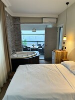 Quarto Deluxe, varanda, vista para o mar