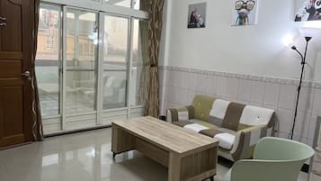 Quarto Triplo Deluxe | Sala