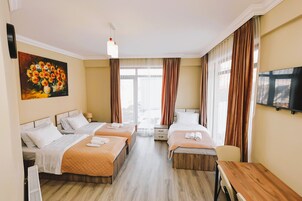 Quarto triplo conforto | Wi-Fi de cortesia