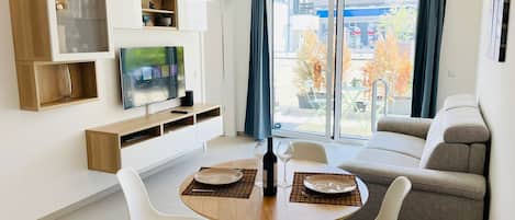Apartamento Deluxe | Sala de estar