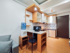 Apartamento | Cozinha privada | Um frigorífico/congelador grande, uma placa de cozinha 