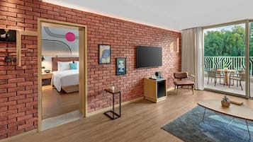 Suíte, 1 cama King e sofá-cama | Roupas de cama premium, frigobar, cofres nos quartos