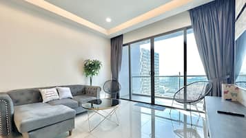 Apartamento conforto, 1 quarto, para não fumantes | Área de estar | Smart TV 42 polegadas com canais a cabo, Netflix, serviços de streaming