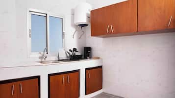 Apartamento luxo, 1 quarto, para não fumantes, sacada | Cozinha privada