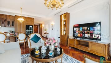 Apartamento Exclusivo | Sala de estar | Smart TV de 60 polegadas com canais digitais