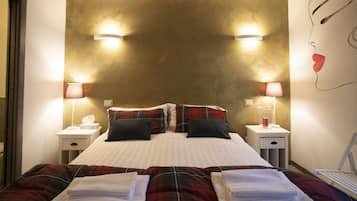 Quarto conforto | Individualmente decorados, individualmente mobiliados, cortinas blackout