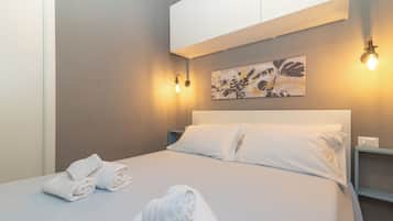 Apartamento Familiar, vários quartos (White Sand House) | 1 quarto, Wi-fi grátis, roupa de cama fornecida