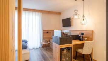 Quarto standard | Edredons de pluma, frigobar, cofres nos quartos, escrivaninha
