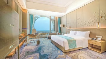 Quarto Deluxe | Minibar, cofre no quarto, secretária