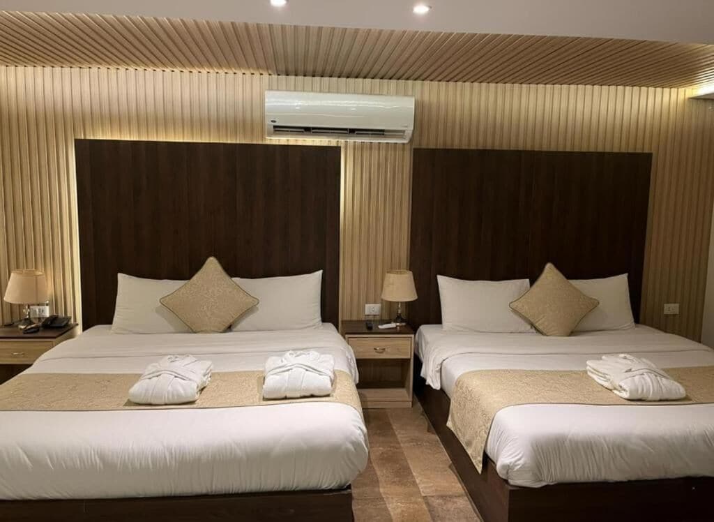 Quarto família, vista para a montanha