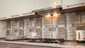 Apartamento Comfort | Cozinha privada | Uma chaleira elétrica 