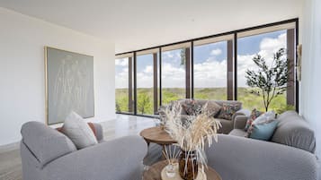 Apartamento Nobre | Sala de estar | TV de ecrã plano