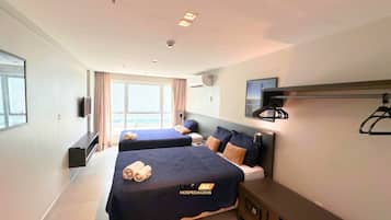 Apartamento | Roupa de alta qualidade, edredões de penas, camas de colchão pillowtop