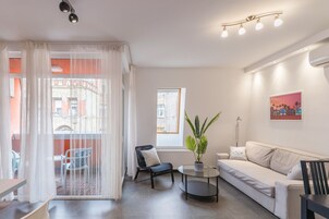 Apartamento Cidade | Sala de estar | Televisor LCD 