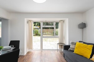 Apartamento, 2 quartos | Área de estar