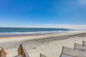 Na praia, toalhas de praia