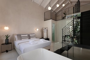 Suíte júnior | Roupas de cama premium, edredons de pluma, camas com colchões pillow-top