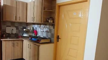 Quarto Duplo Deluxe | Espaço de cozinha partilhado