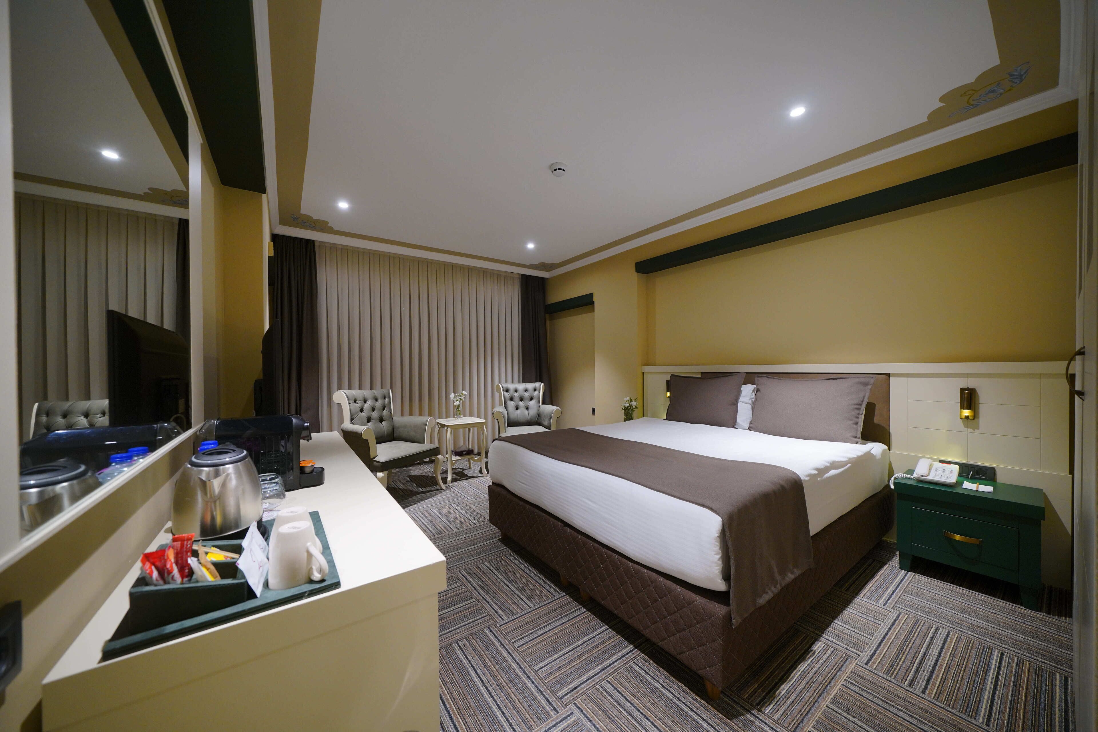 Deluxe Room with Jacuzzi | Lençóis de algodão egípcio, roupa de alta qualidade 