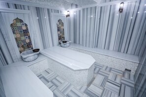 Sauna seca, sauna a vapor