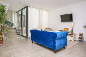 Suite Deluxe | Sala de estar | Televisor LCD 