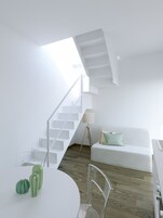 Apartamento conforto | Área de estar | Smart TV 32 polegadas com canais a cabo, Netflix, serviços de streaming